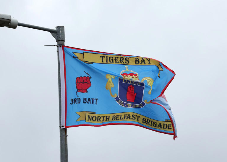 UDA and bonfire flags erected near contentious north Belfast pyre