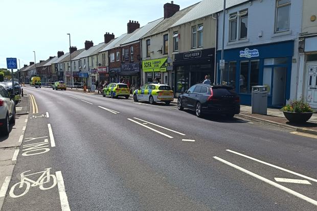 Two people in hospital after police cordon off North East high street