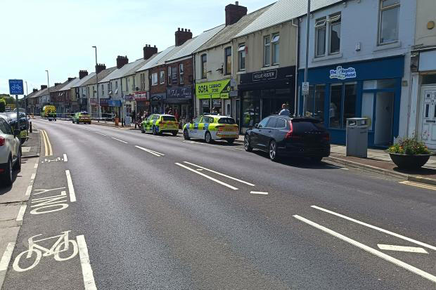 Two people in hospital after police cordon off North East high street