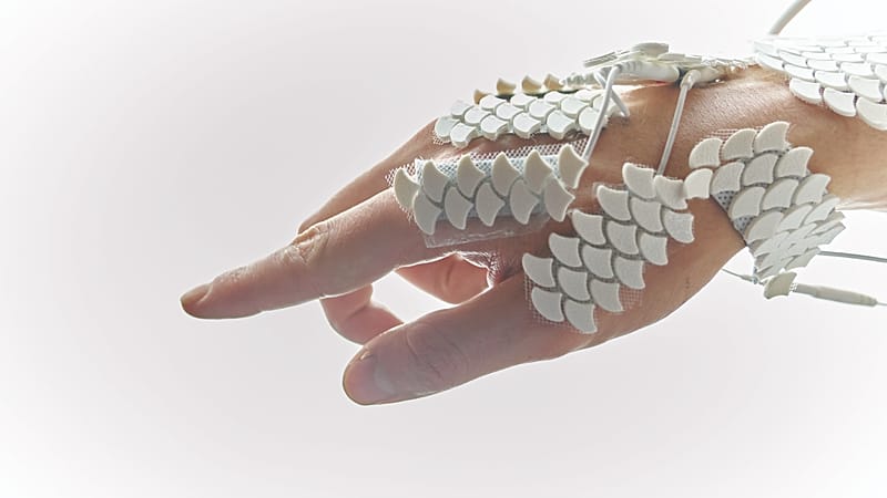 What if AI could move your hand? Students build a wearable device using ...