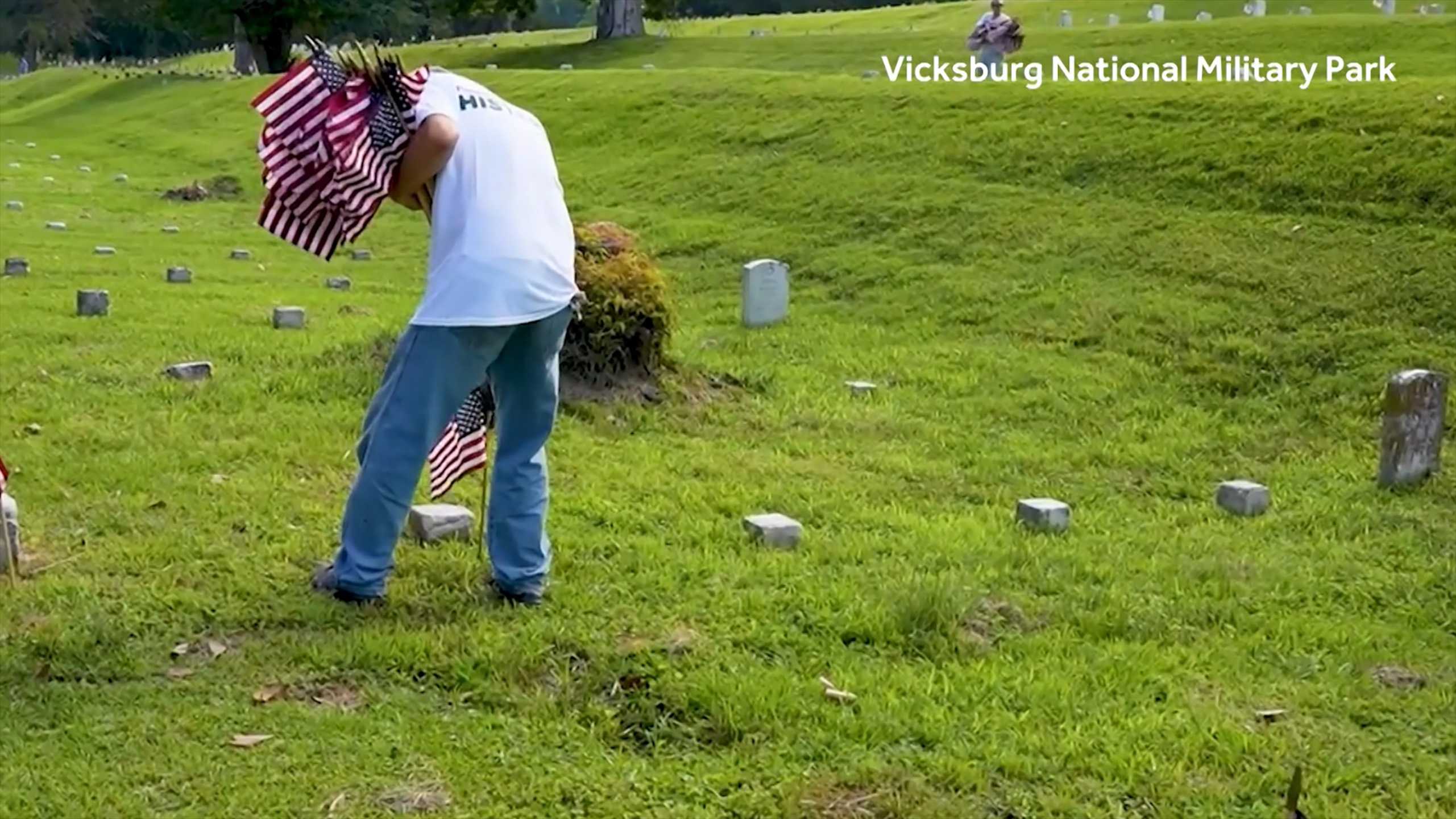 Volunteers place flags on 17,000 graves at Vicksburg National Military Park