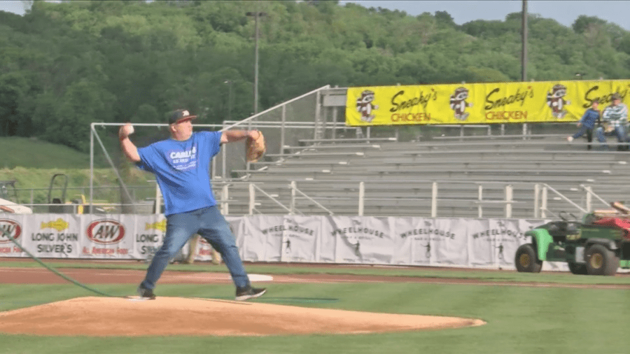 US Senate candidate Jim Carlin throws first pitch at Explorers home opener