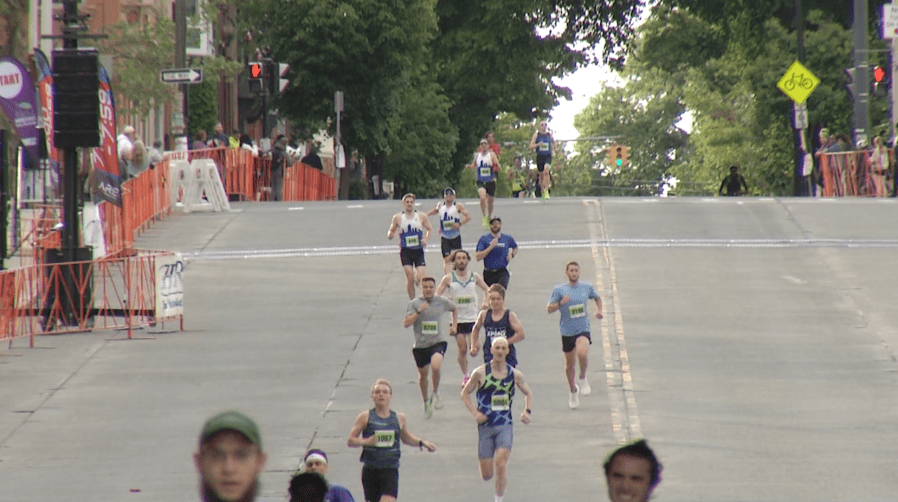 Participants lace up shoes for CDPHP Workforce Team Challenge