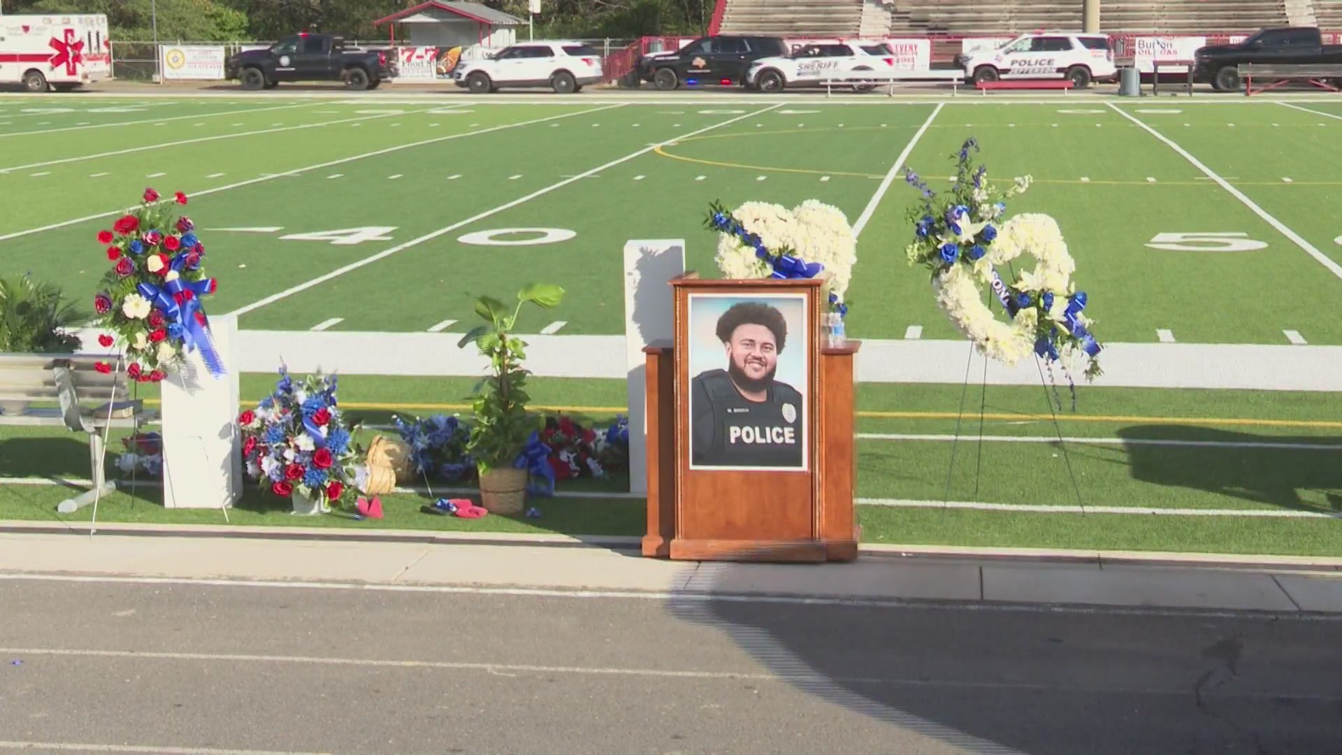Fallen police officer Marc Brock is dedicated a portion of Hwy 1