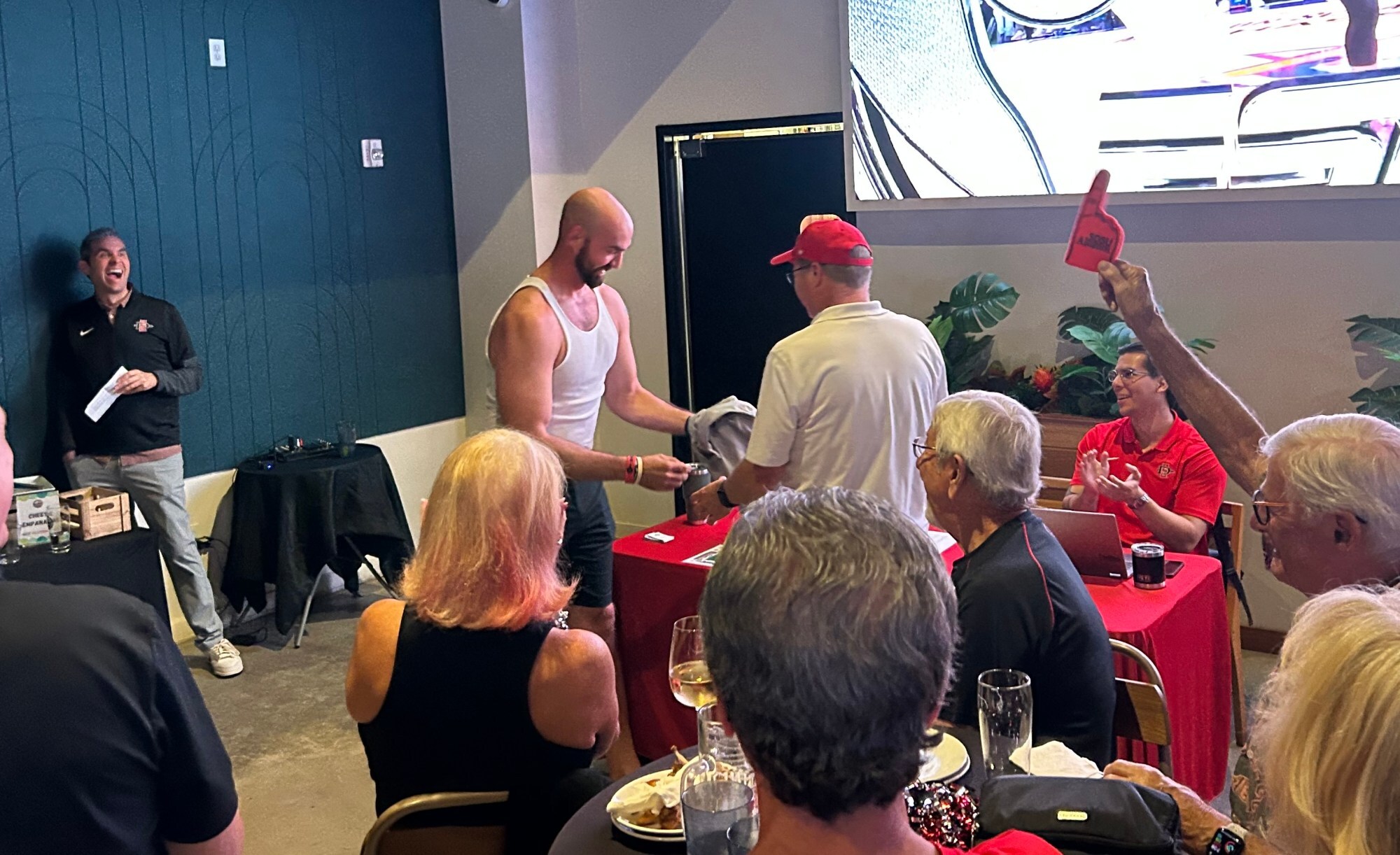 Aztecs coach Sean Lewis gives shirt off his back to bring fans to ...