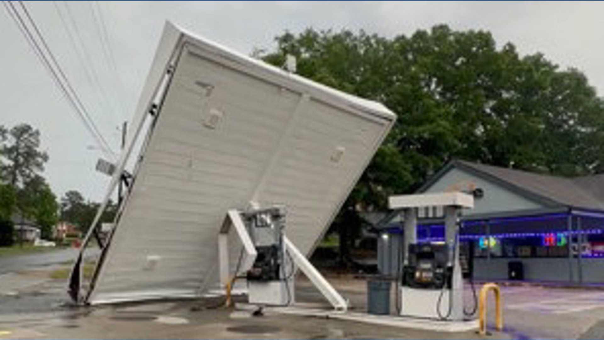 Gas station roof blown off by strong winds in Macon