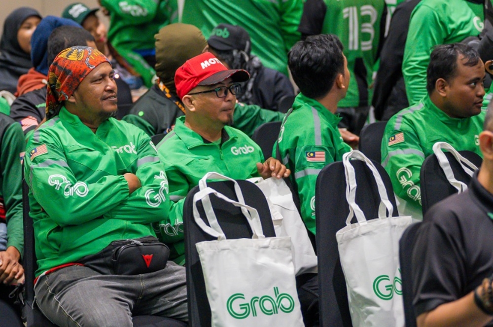 Grab distributes vouchers, digital tools to support drivers, delivery ...