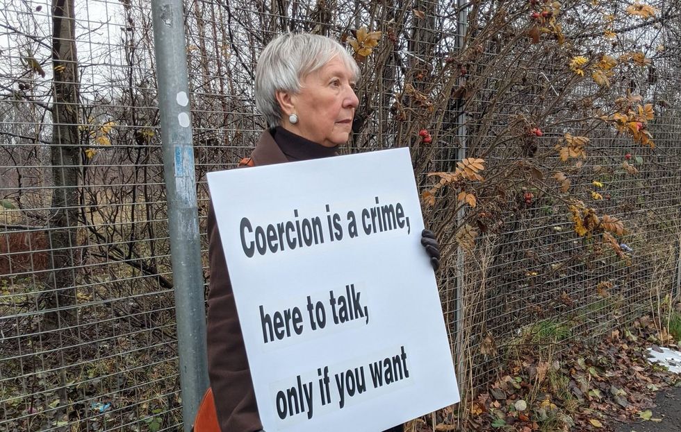 Crown Office backs down on Christian pensioner who held 'here to talk ...