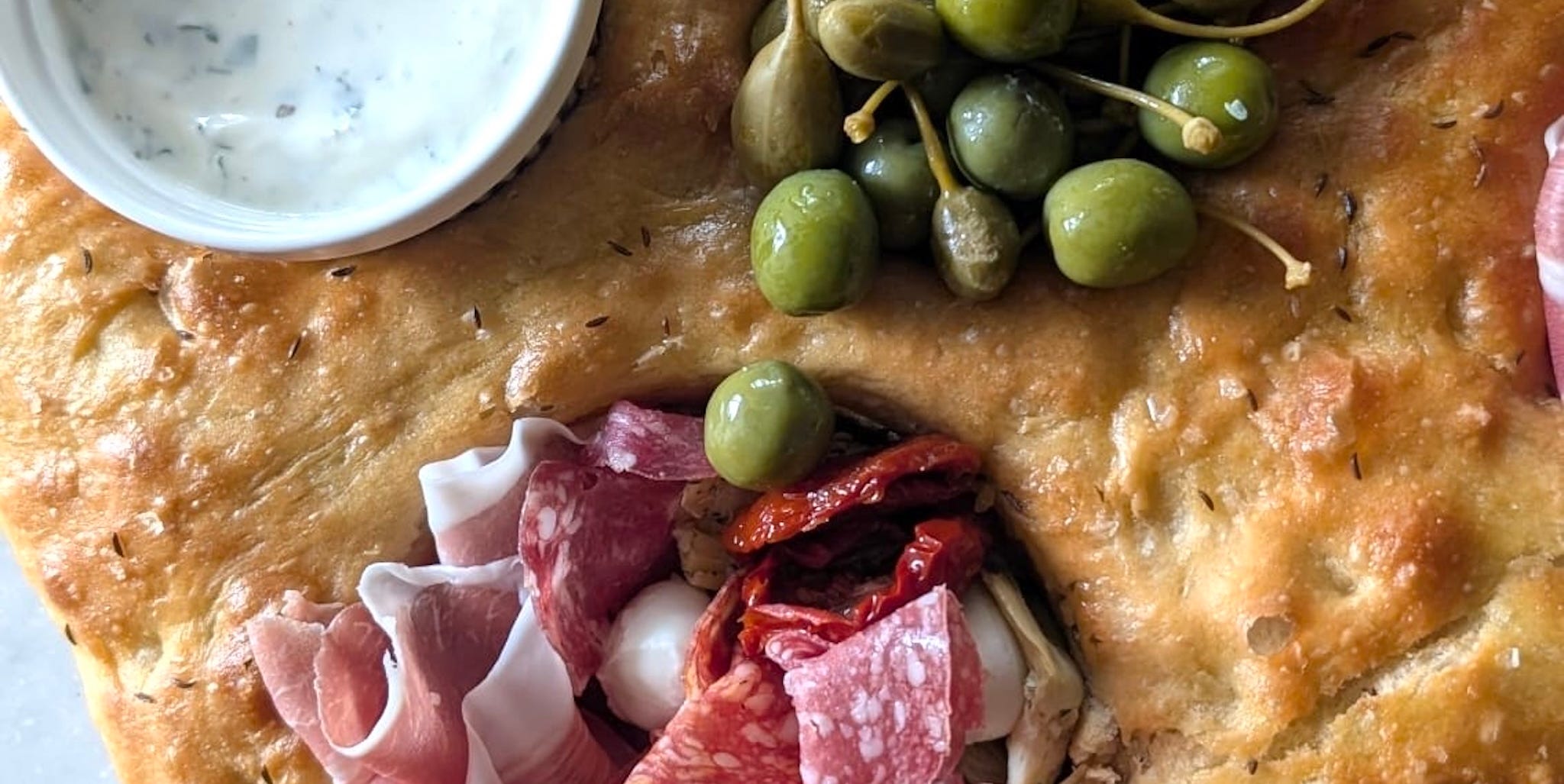 This viral focaccia charcuterie board recipe is perfect for bank ...