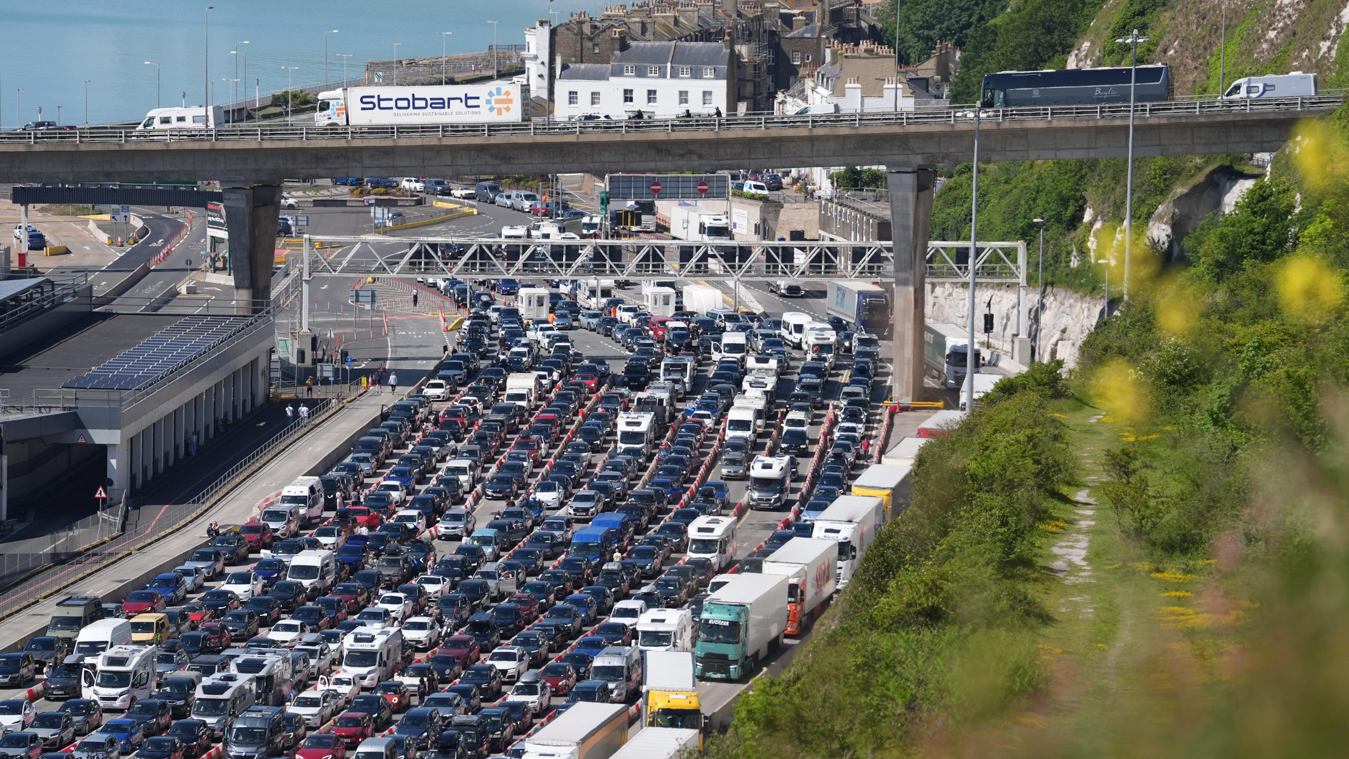 New EU border checks at Dover suspended after queues on hot bank ...