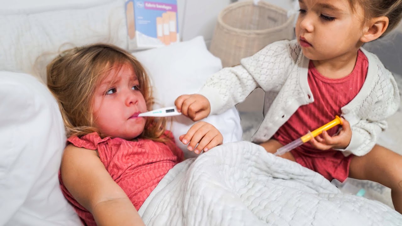 Watch adorable twins act as doctors during imaginative playtime
