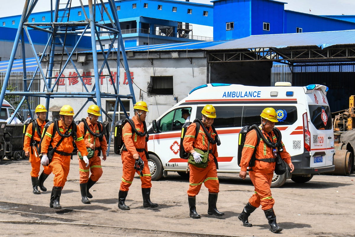 At least 90 killed and dozens trapped after mine explosion in China