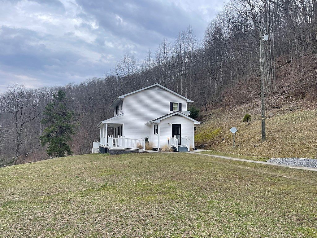 Explore a 1987 farmhouse in Honaker, Virginia, featuring a welcoming ...