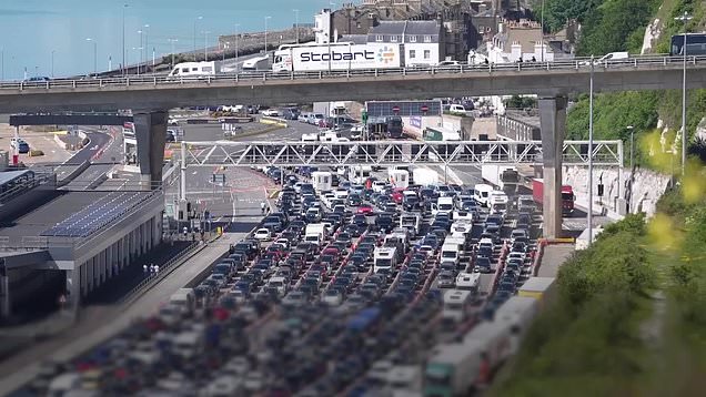 New EU border checks at Dover suspended after queues on hot bank ...