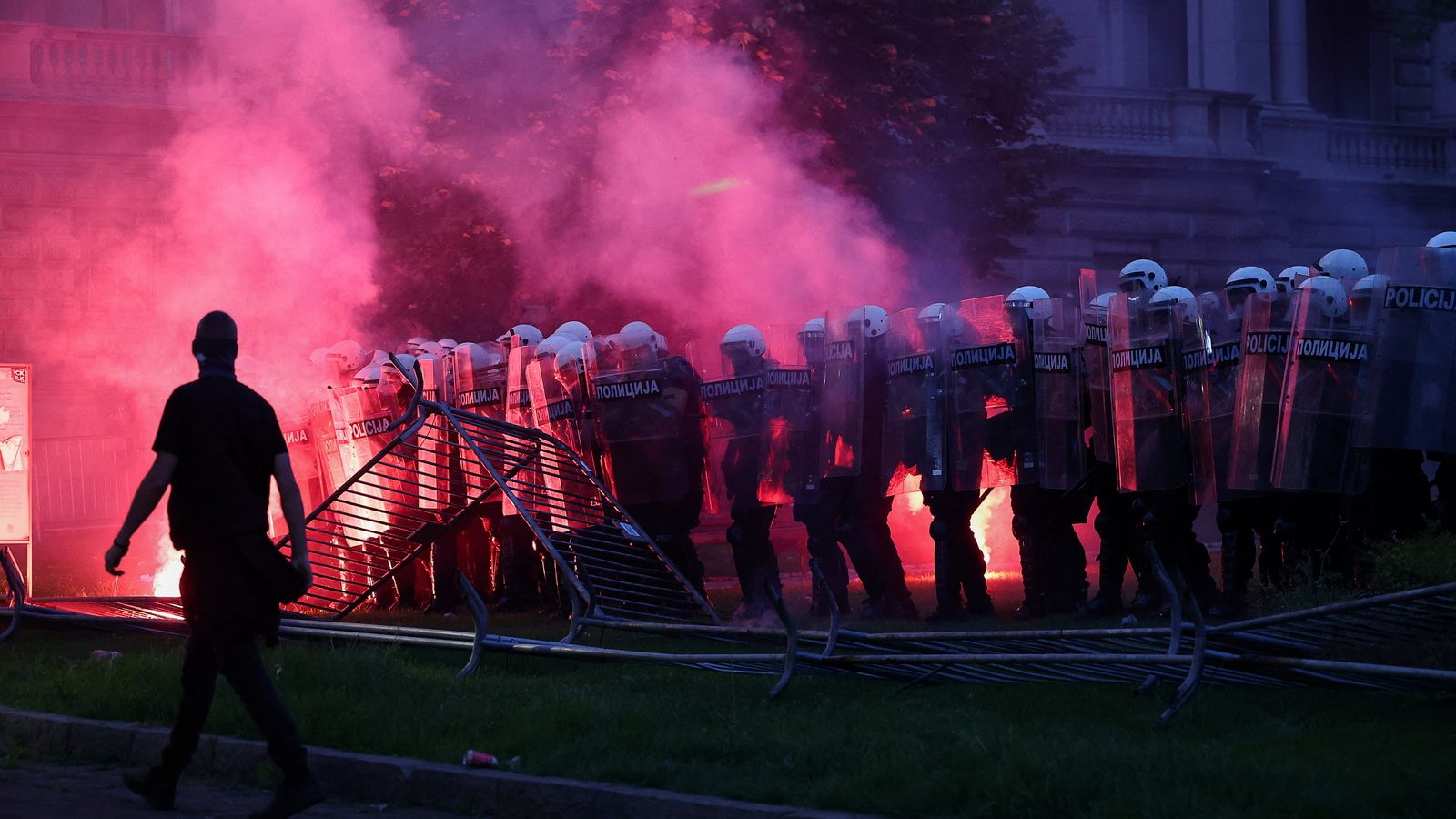 Protesters clash with riot police in Serbia
