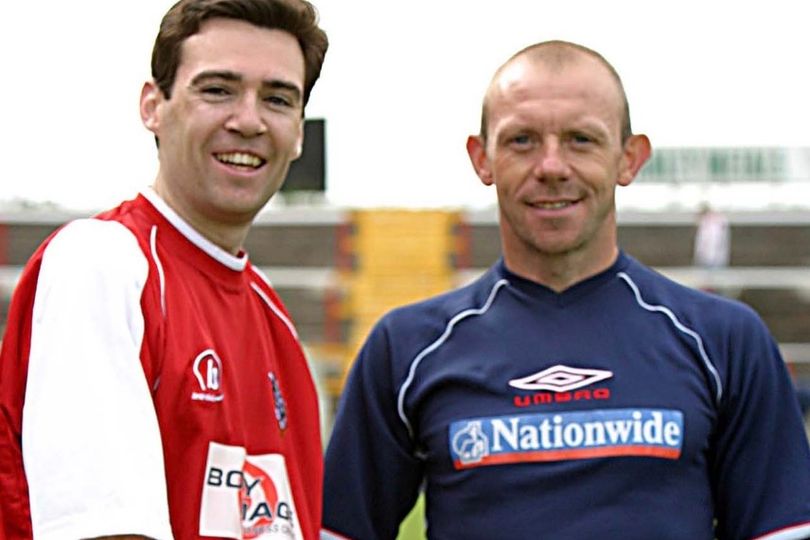 Everton fan Andy Burnham pictured in red and white kit as he plays ...