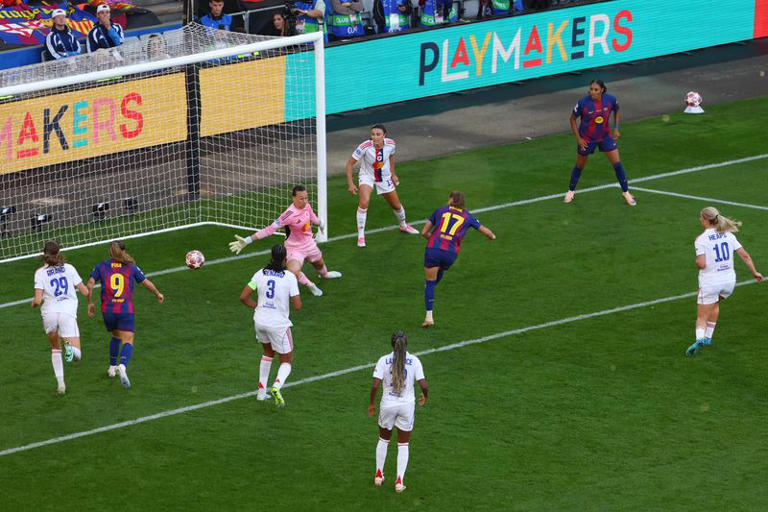 Soccer-Barcelona power to 4-0 women's Champions League final win over Lyon
