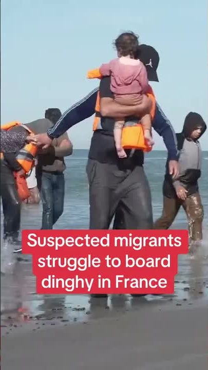 Suspected migrants struggle to board dinghy #themirror #news