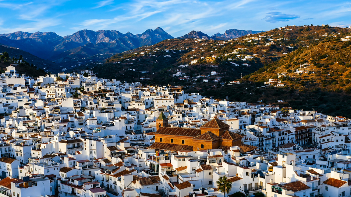 Historic Spanish style village with scenic natural landscape