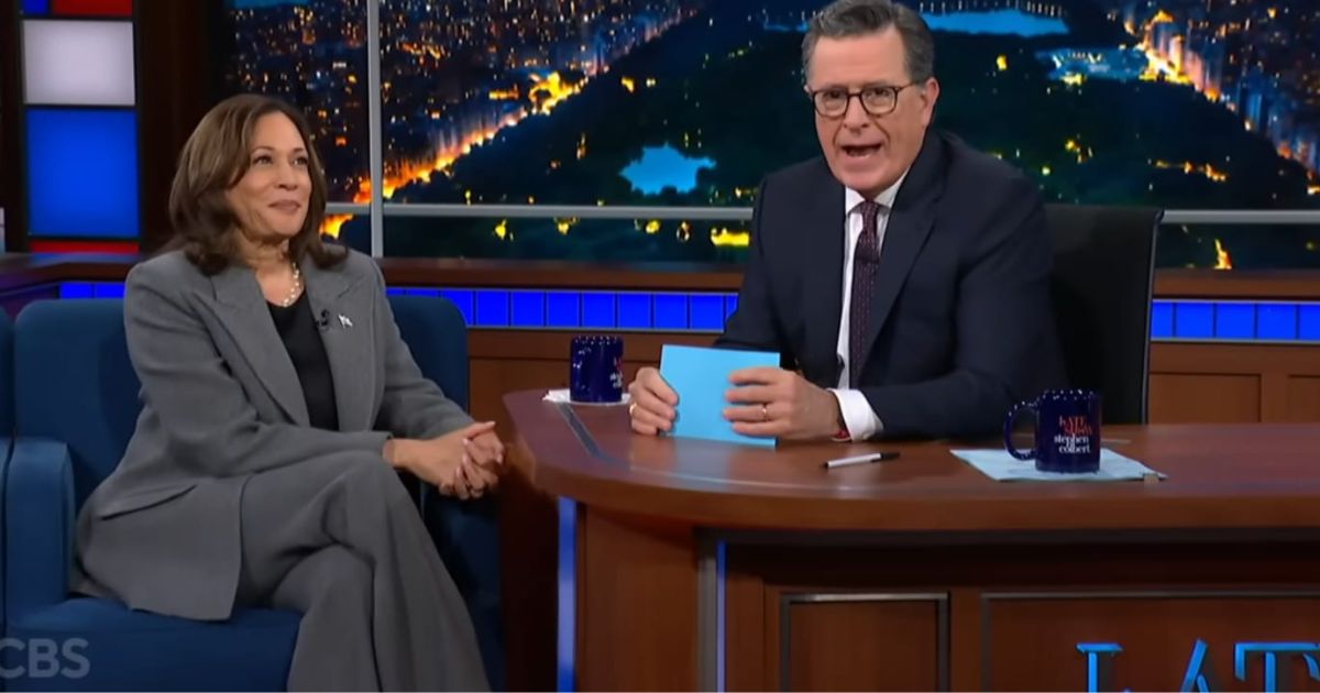 Kamala Harris quietly stands by Stephen Colbert as Trump fans cheer his ...