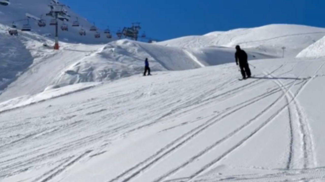 Skier launches into air but loses control during high jump landing