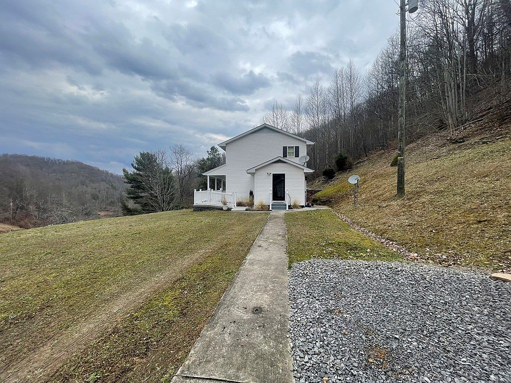 Explore a 1987 farmhouse in Honaker, Virginia, featuring a welcoming ...