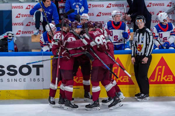 Latvia hands US its third loss at the ice hockey worlds