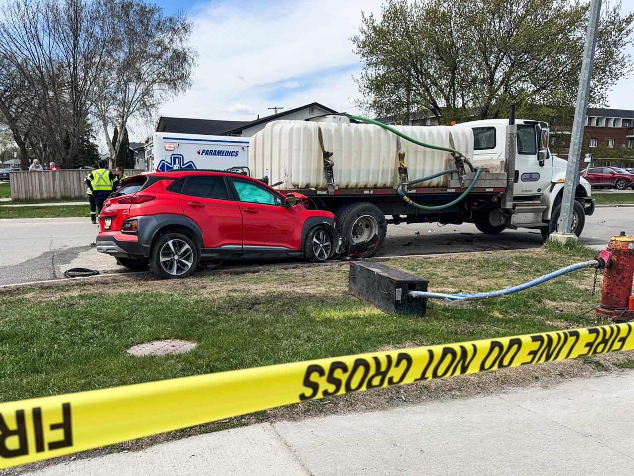 Man, 49, dead after vehicle collides with water truck parked along west ...