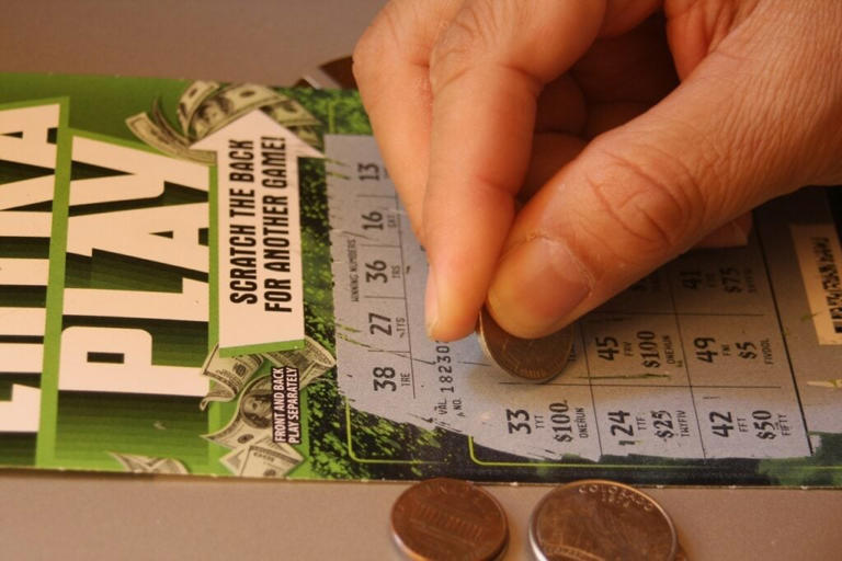 Man wins $20K on $1 ticket after brother-in-law lost $520 and called ...
