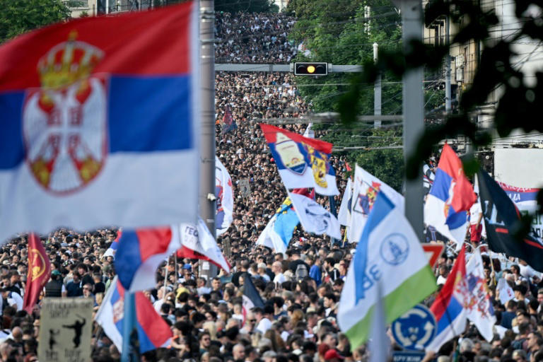 Tens of thousands rally in Serbia demanding elections