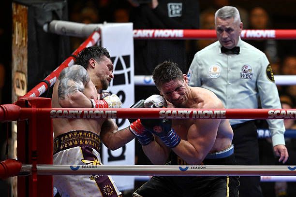 Ukrainian boxer Usyk defeats Verhoeven, retains world heavyweight ...