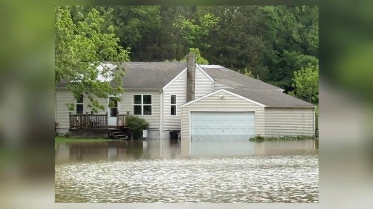 Flooding, high water surrounding homes, across region