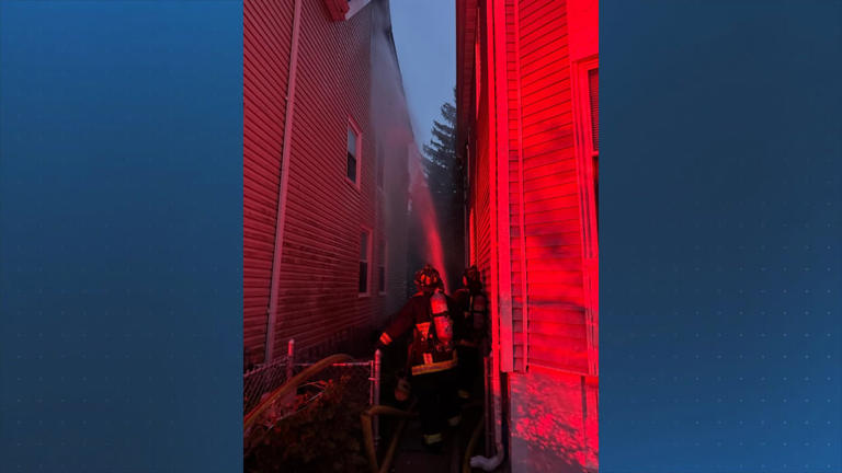 Fire crews battle flames at a residence in Dorchester