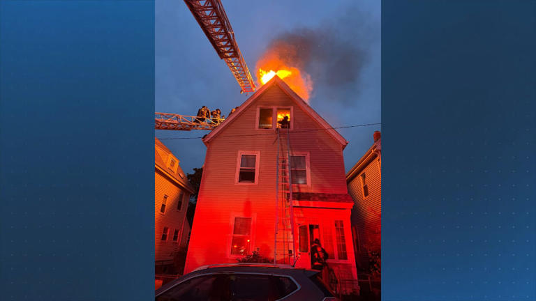 Fire crews battle flames at a residence in Dorchester