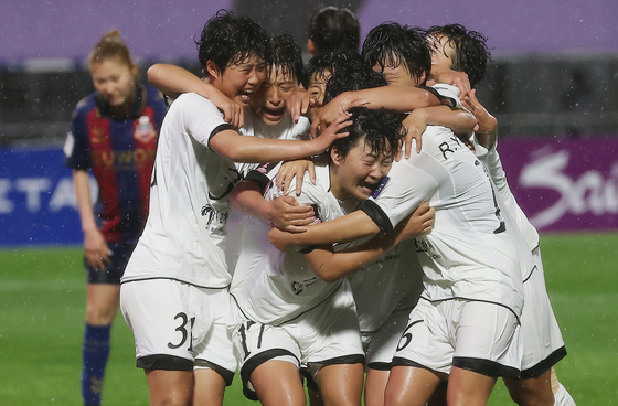 Manager of North's football club thanks party after winning Asian women ...