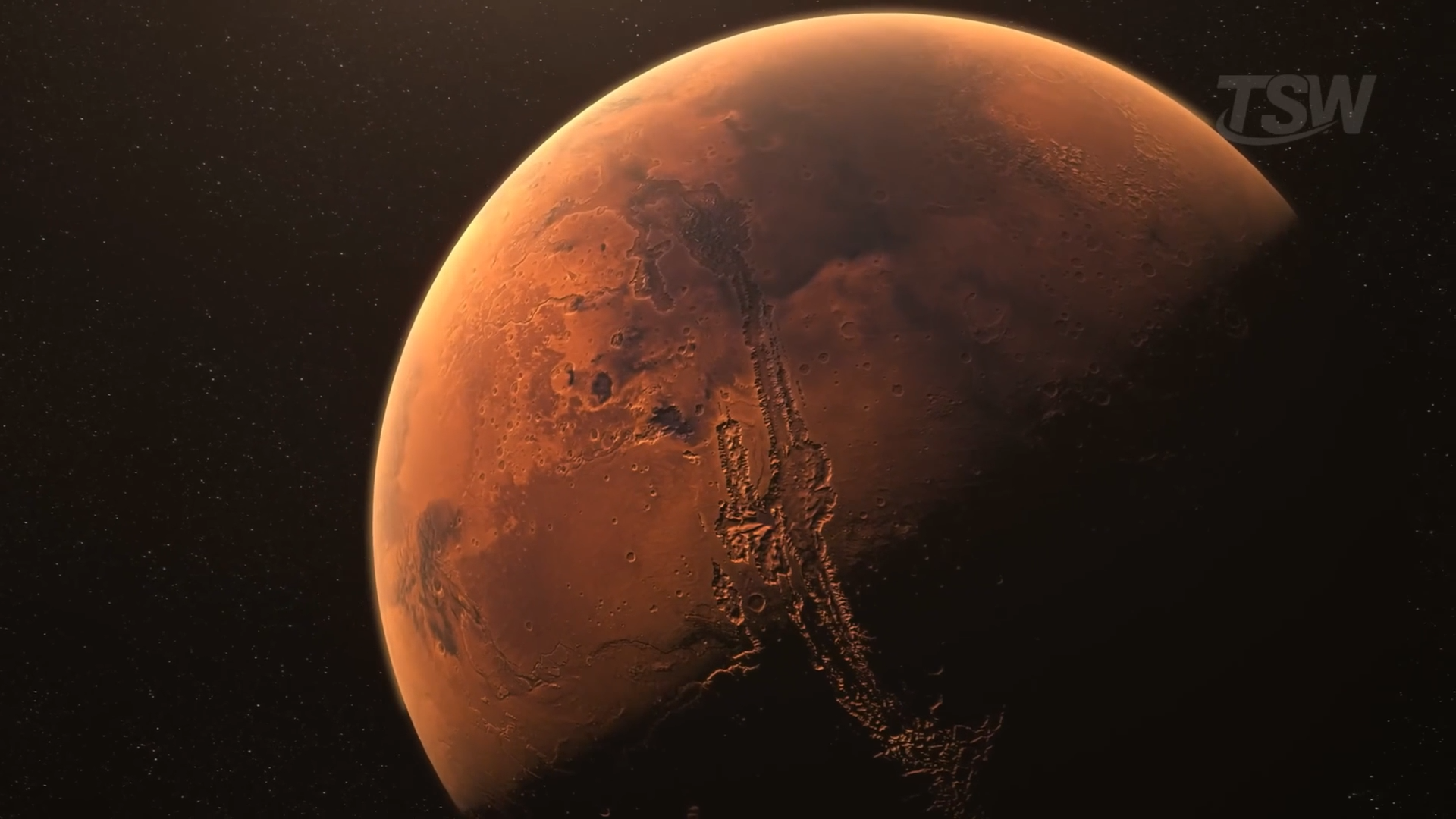 Mars’ grand canyon from orbit: A planet written in stone and ice