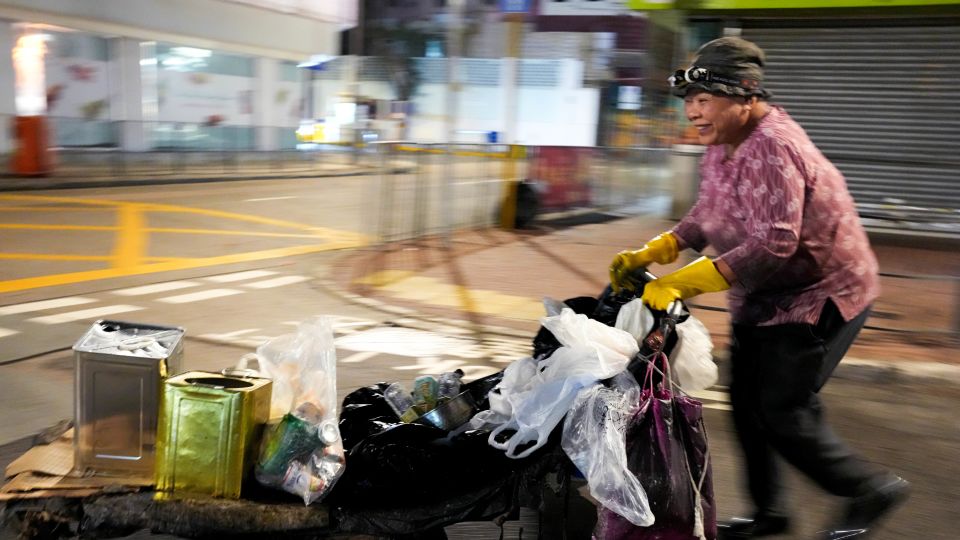 In a city of high-rises, 'cardboard grannies' collect waste for cash