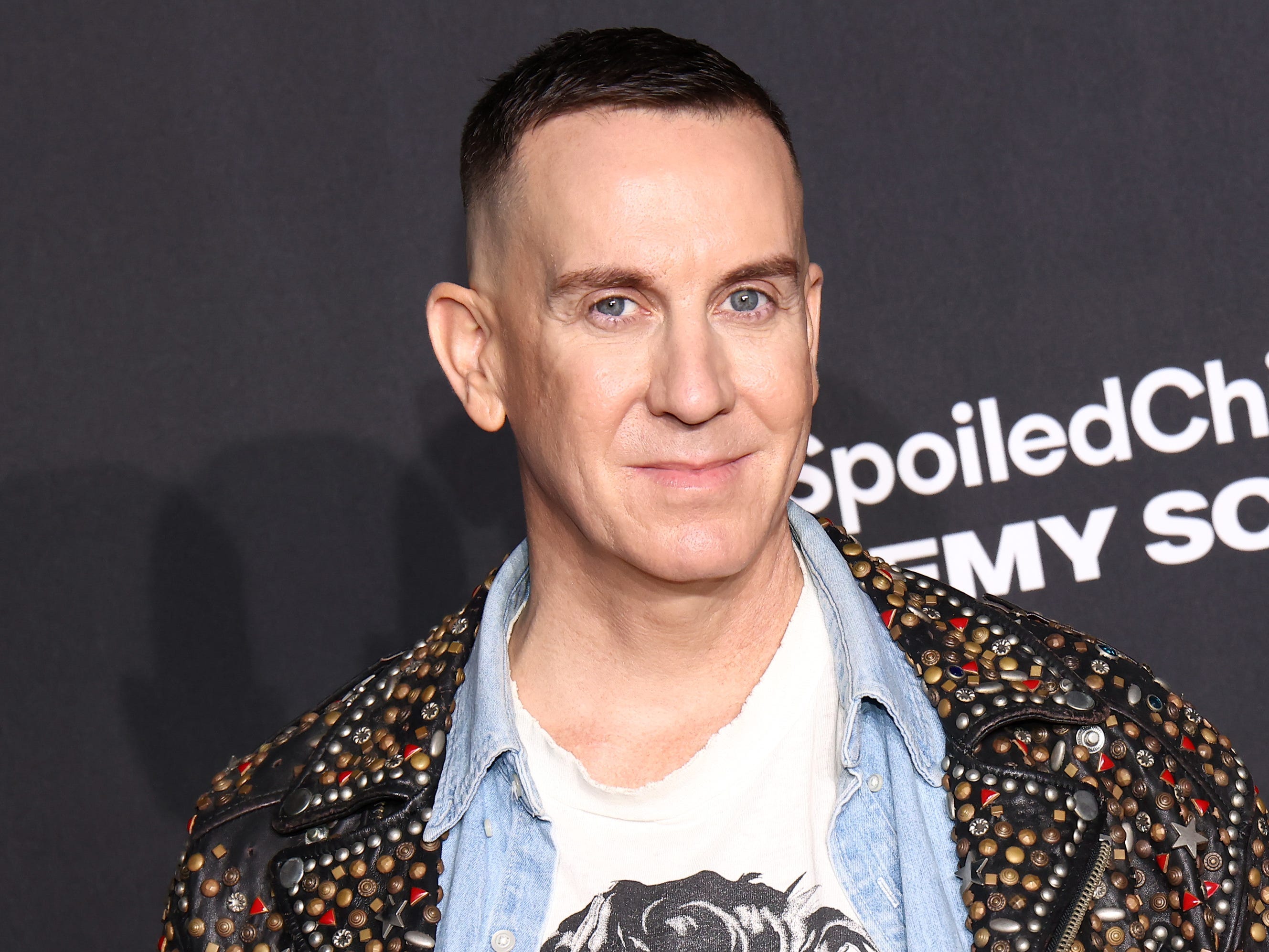 Fashion designer Jeremy Scott gets a huge cheer after ripping up his AI ...