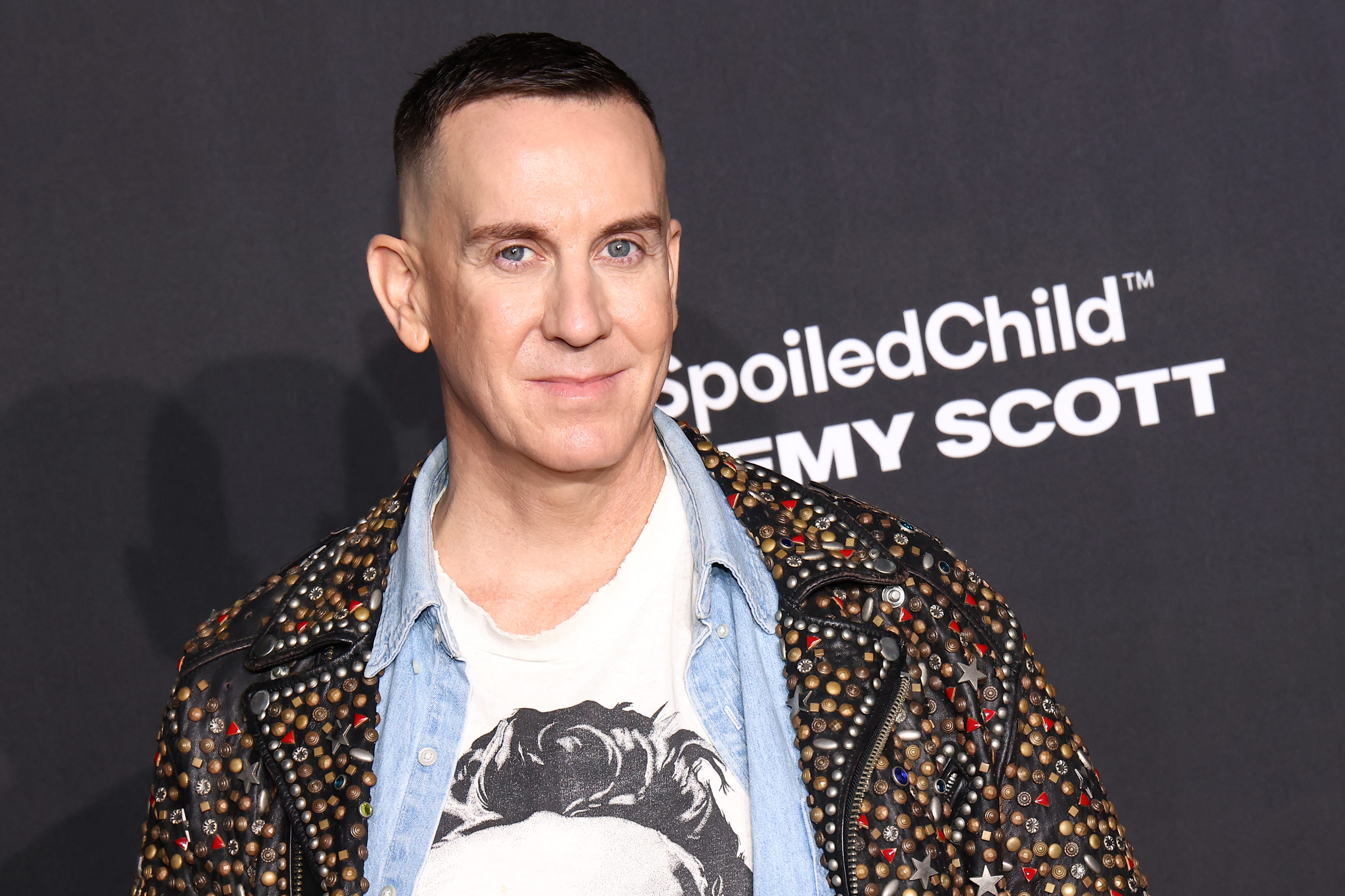Fashion designer Jeremy Scott gets a huge cheer after ripping up his AI ...