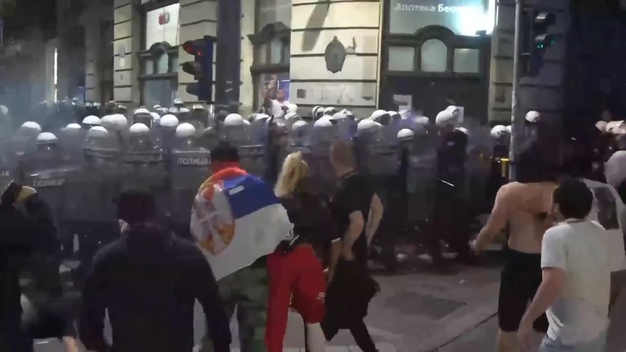 Clashes between protesters and riot police after massive anti ...