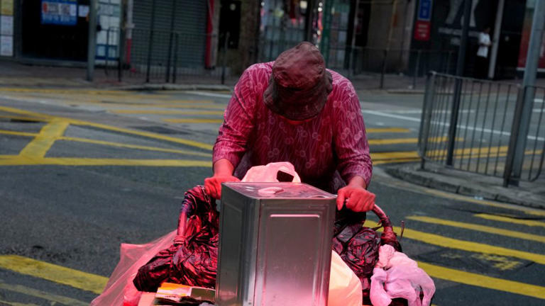 In a city of high-rises, 'cardboard grannies' collect waste for cash