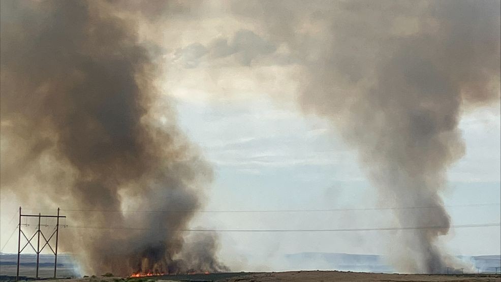 Crews working to contain the 1,500 acre Moore Fire off South Swan Falls ...