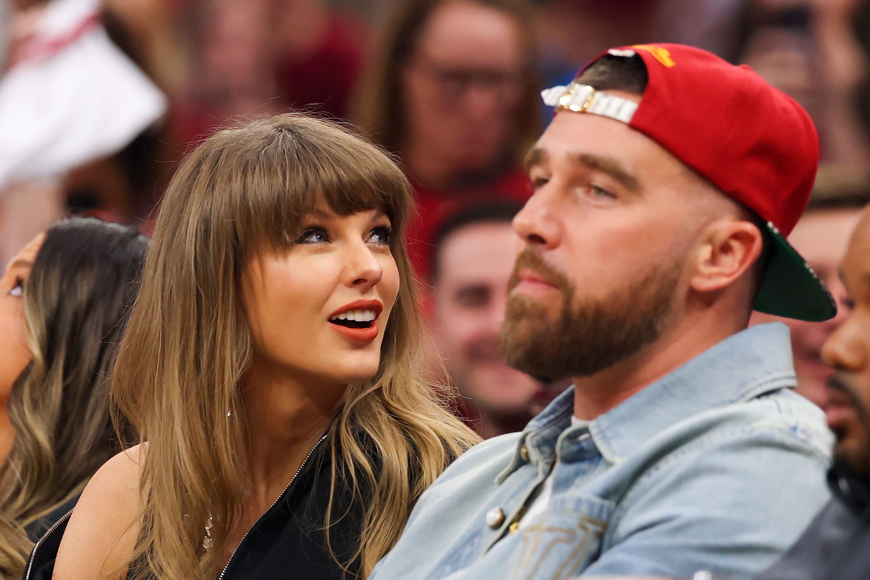 See Taylor Swift's relatable reaction to Travis Kelce chugging a beer ...