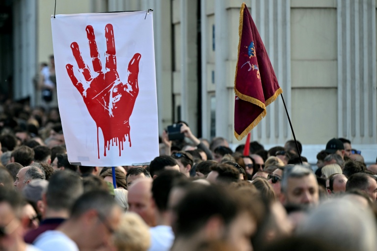 Tens of thousands rally in Serbia demanding elections