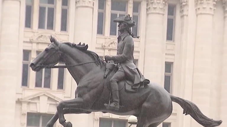 Statue of founding father who enslaved hundreds installed at Freedom Plaza