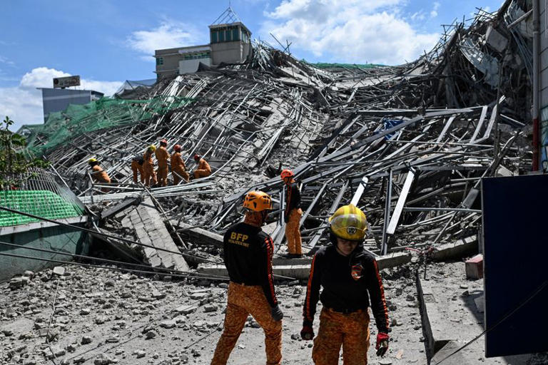 At least one dead in Philippine building collapse, 21 people missing