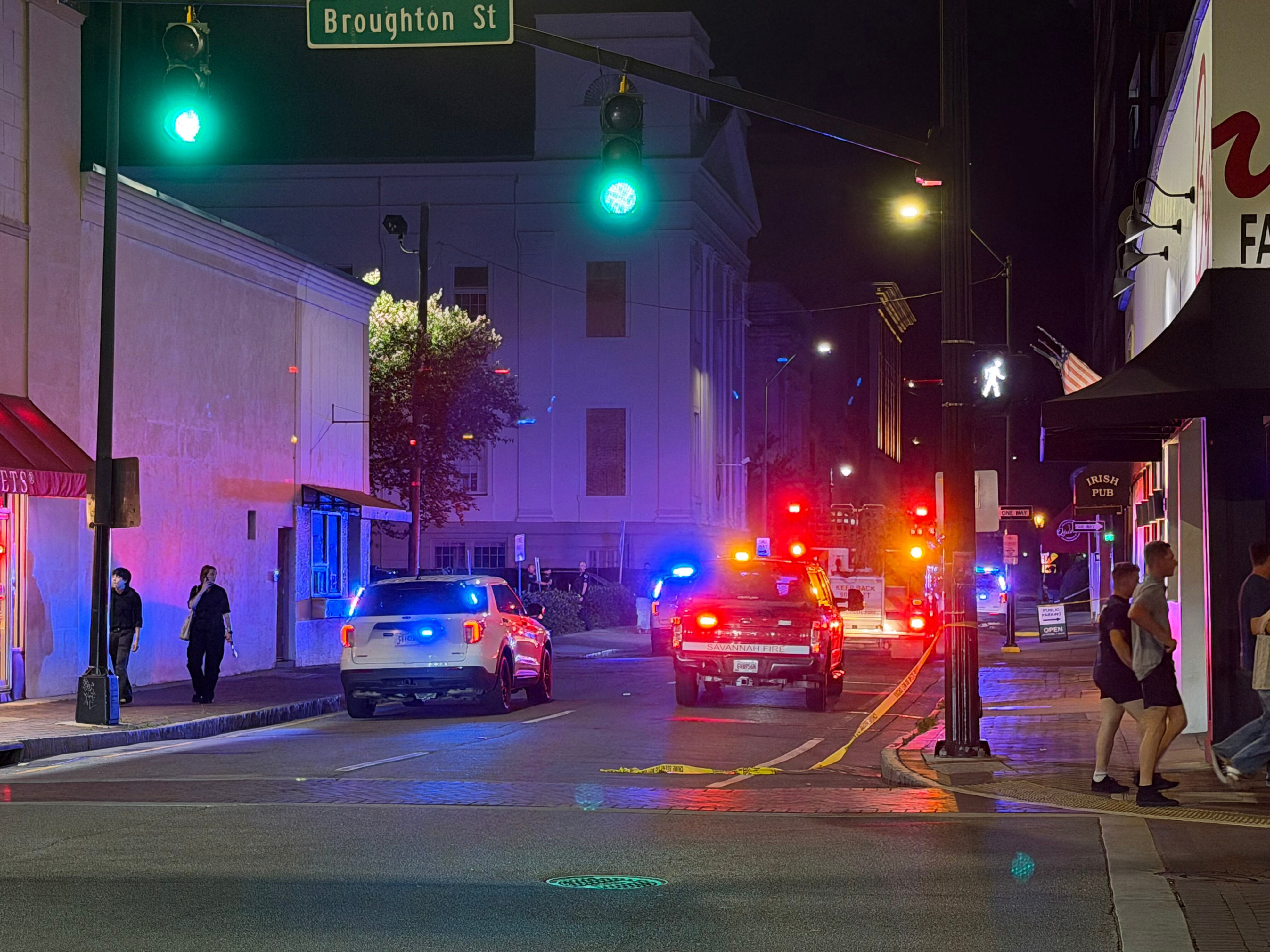 Large police presence on Drayton Street near a parking garage