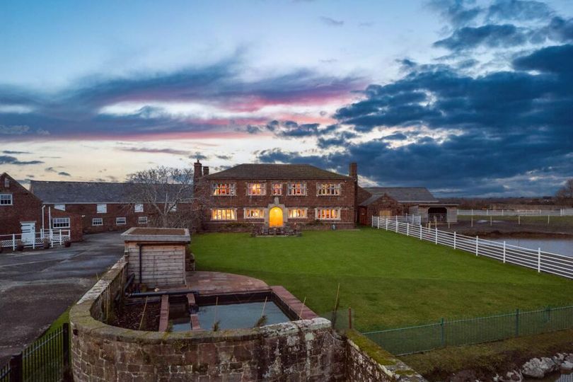 Wirral home with its own drawbridge, moat and hidden priest holes