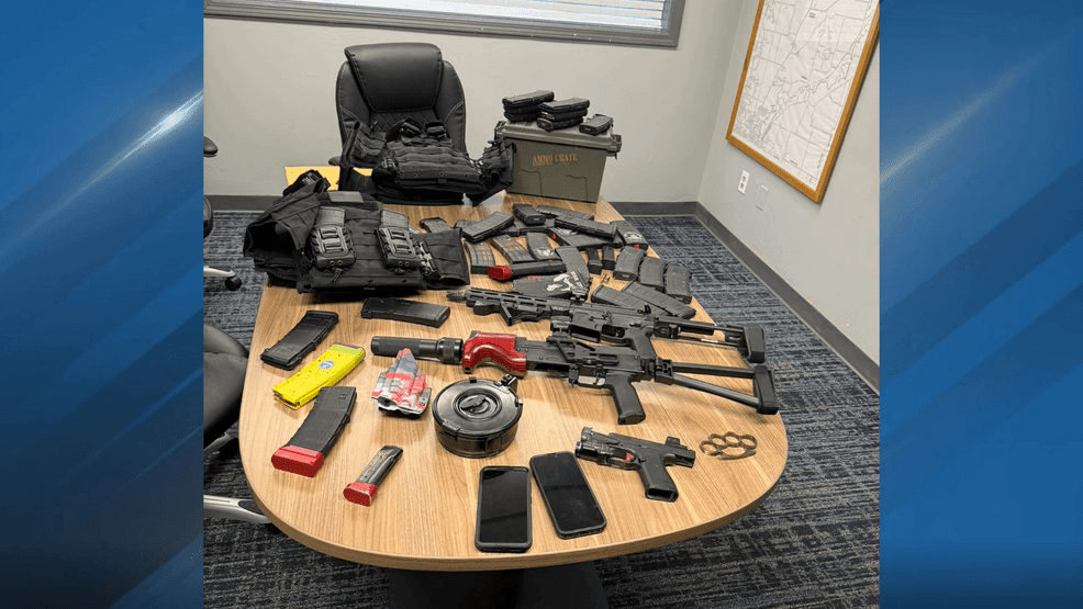 Loaded guns, ammo, bulletproof vests, brass knuckles seized, two ...