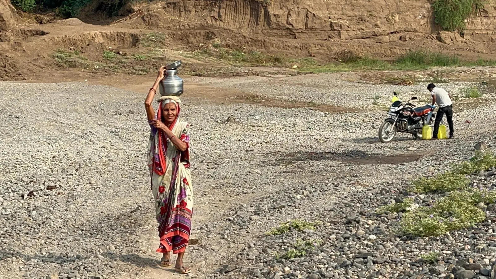 Scorching apathy at 47°C: Kavatha digs for drops in cracked riverbed